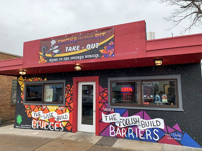 The colorful exterior of Smoke in the Pit features inspiring messages alongside promises of delicious takeout &ndash; a community treasure serving up Minneapolis' most soulful BBQ.