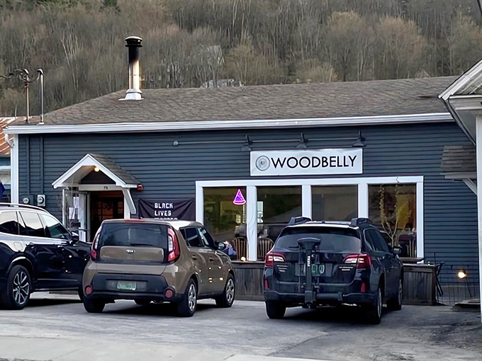 The blue-gray siding and simple signage of Woodbelly Pizza houses some of Vermont's most innovative and sustainable pizza creations.