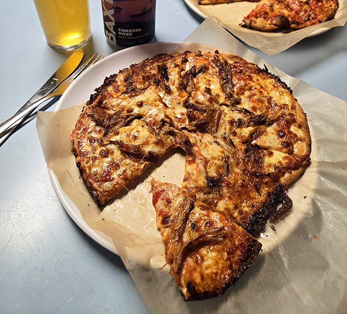 The cheese pizza – deceptively simple yet impossibly delicious – showcases Pat's commitment to quality ingredients.