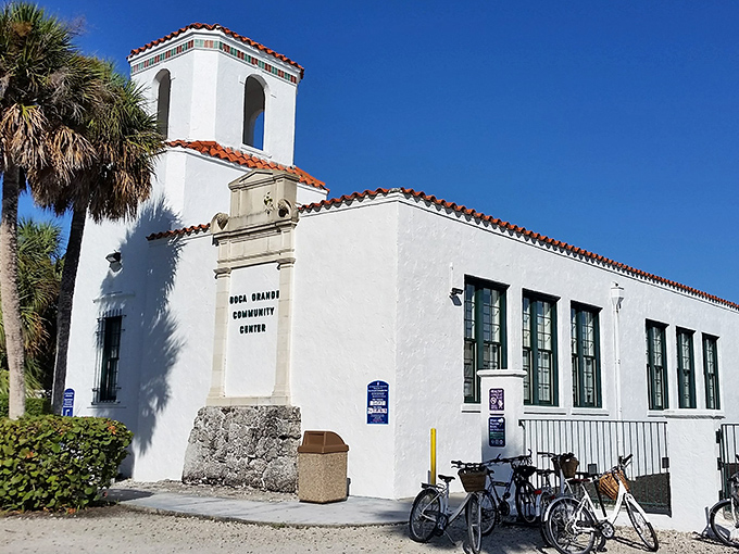Spanish-Mediterranean elegance houses the heart of island culture, where locals gather and visitors discover Boca Grande's rich history.
