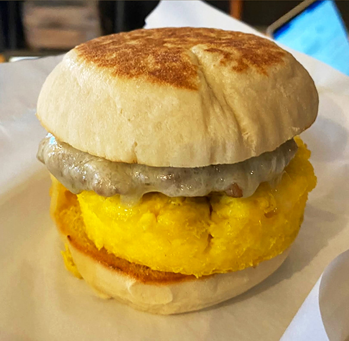 This breakfast sandwich isn't just food – it's an edible love letter from Vermont farms, with an egg so perfect it deserves its own Instagram account.