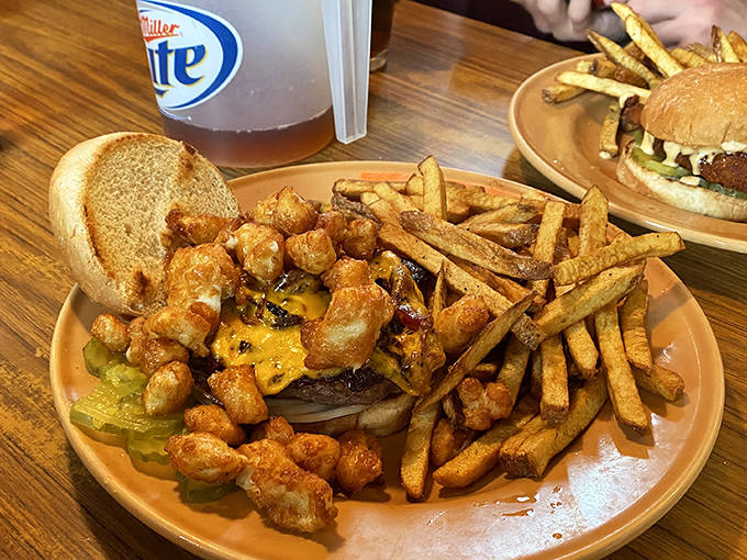 Wisconsin meets Minnesota in this burger masterpiece, where melted cheese curds crown a juicy patty with Midwestern pride.