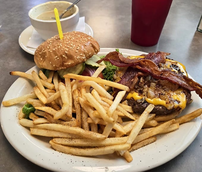 This burger and fries combo proves the kitchen's skills extend beyond breakfast, delivering juicy patties and crispy fries that satisfy any time.