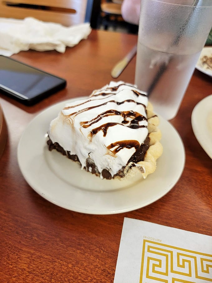 This chocolate cream pie isn't just dessert&mdash;it's a towering monument to the art of sweet indulgence, crowned with a zigzag of chocolate.