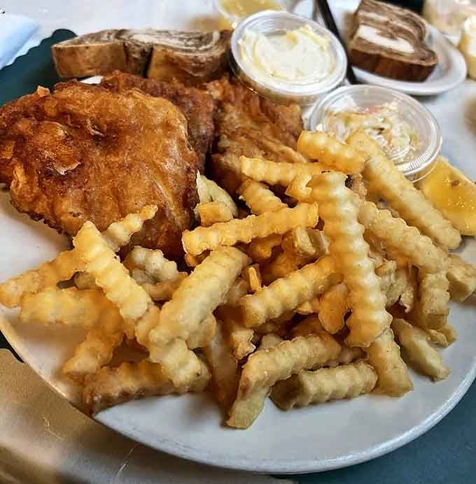 Friday fish fry done right: golden cod and crinkle fries that would make any Wisconsin grandmother nod with approval.