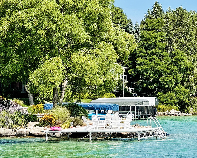 Lakeside living at its finest, where every dock feels like the gateway to another world of blue-green tranquility.