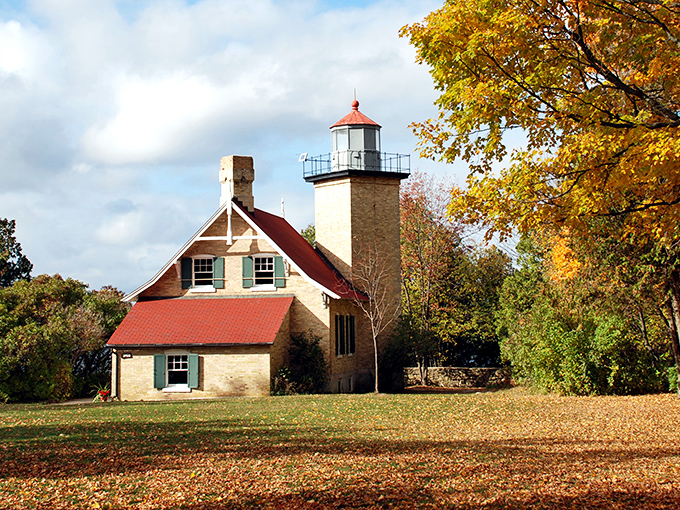 Eagle Bluff Lighthouse has guided sailors since 1868, now guiding visitors through Door County's maritime history instead.