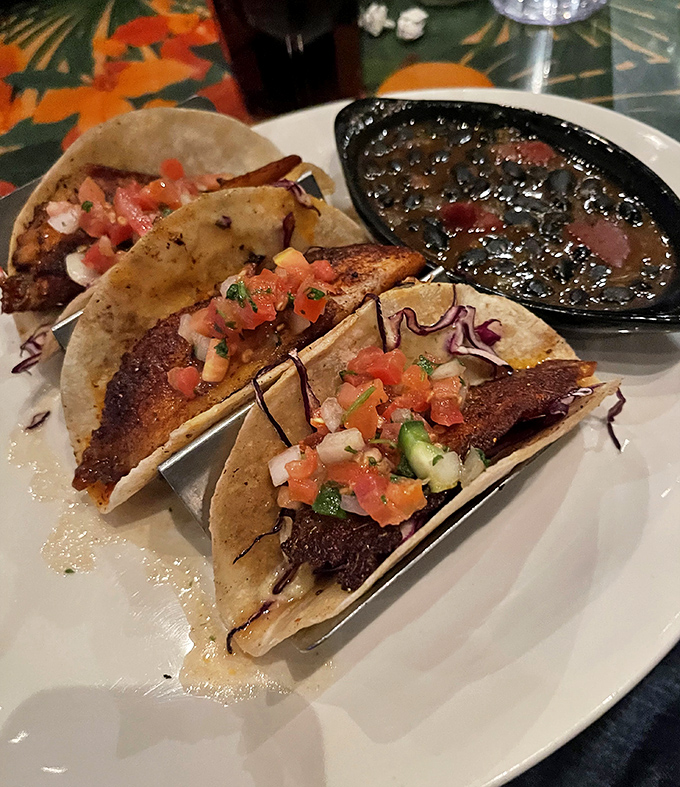These fish tacos bring a splash of coastal flavor to the jungle, with fresh pico de gallo adding bright notes to perfectly seasoned fillets.