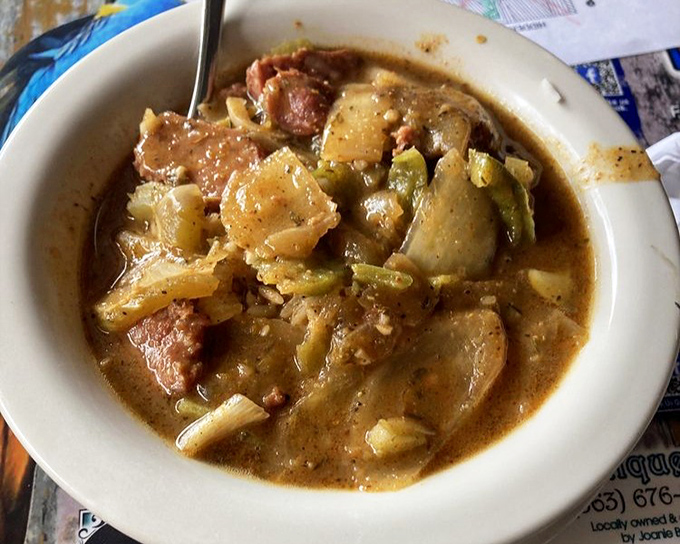 Gumbo that's darker than a Florida thundercloud, packed with sausage and seafood treasures hiding in every spoonful.