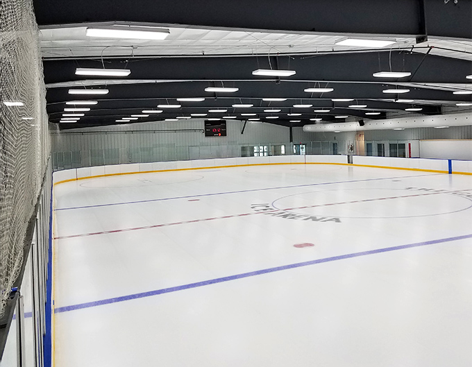 The pristine sheet awaits its next adventure – whether figure skating jumps, hockey sprints, or bumper car spins.