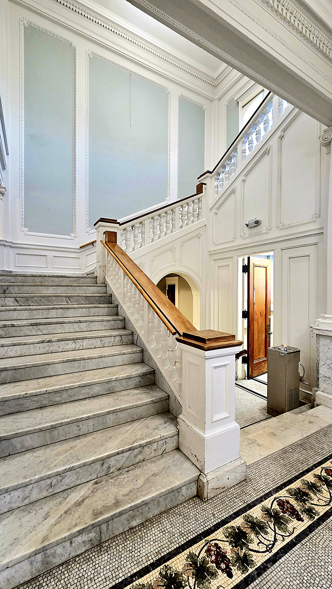 This isn't just any staircase, it's the kind that makes you want to descend dramatically while imagining yourself in a period drama.
