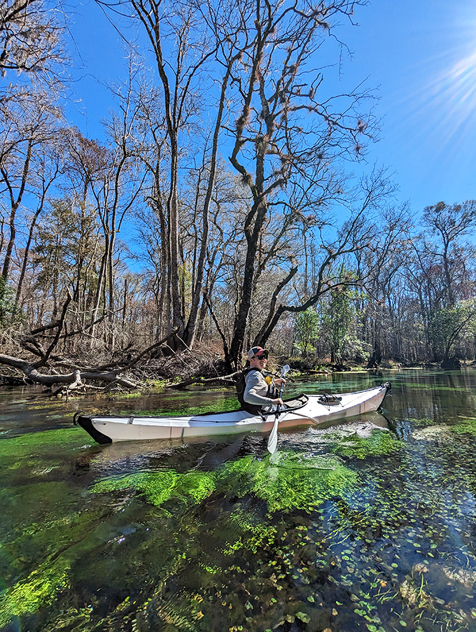 Kayakers glide over water so clear it seems like they're floating on air &ndash; nature's version of a glass-bottom boat.