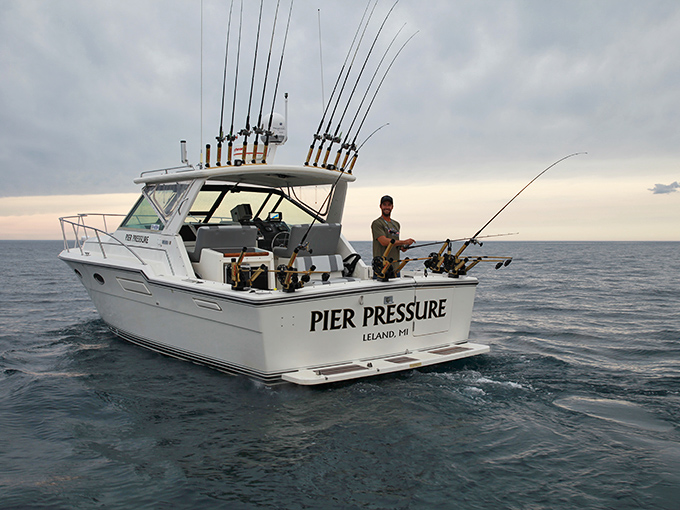 "Pier Pressure" isn't just a clever name – it's your ticket to Lake Michigan's bounty of salmon and trout with experienced captains at the helm.