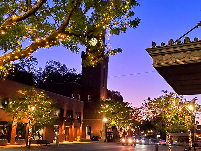As darkness falls, twinkling lights transform the town center into a magical scene straight from a New England storybook.