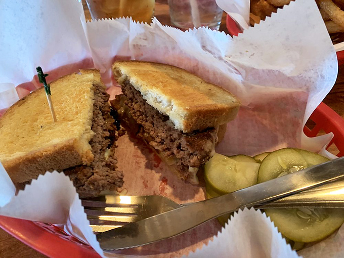 The legendary Patty Melt, where beef meets Swiss cheese and grilled bread in a sandwich romance that would make Shakespeare weep.