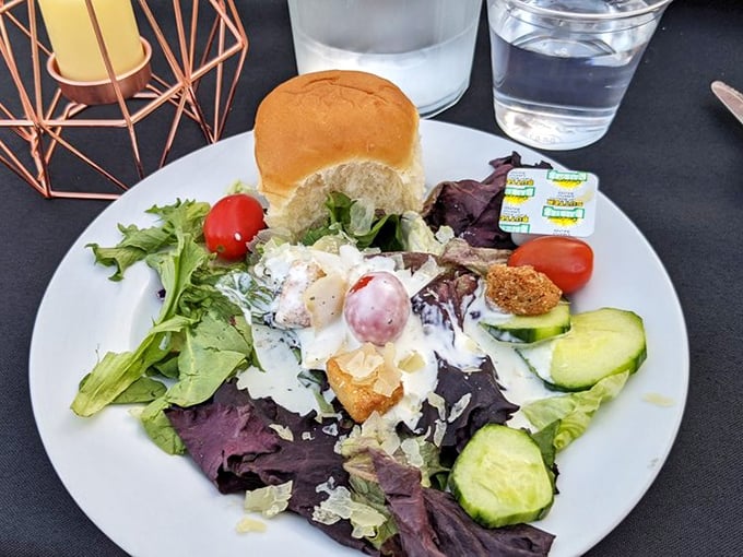 Fresh salads provide a crisp counterpoint to heartier offerings, with house-made dressings adding a touch of homemade charm.