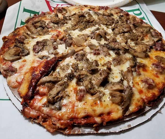 Sausage Mushroom Pizza: Fresh mushrooms and perfectly seasoned sausage crumbles play a delicious duet on this thin-crust masterpiece that's converted even the most stubborn mushroom skeptics.