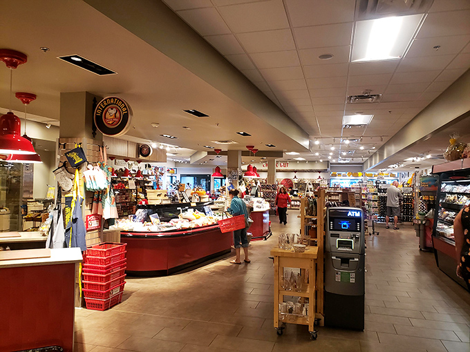 Shoppers browse the extensive selection, each face showing that unmistakable "kid in a candy store" expression that only comes from serious cheese contemplation.