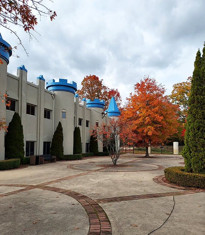 Meticulously maintained grounds frame the castle's side view, where every turret and window tells part of this unexpected Michigan story.