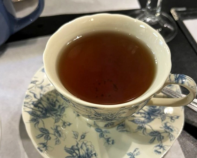 A cup of amber perfection served in blue-patterned china &ndash; this tea isn't rushing anywhere, and neither should you while enjoying it.