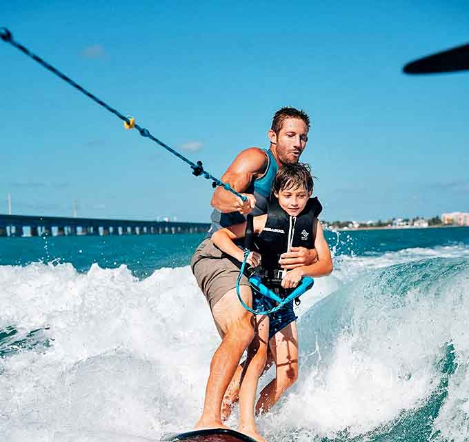 Water sports take on new meaning when you're surfing off your private island, with nothing but blue horizons in every direction.