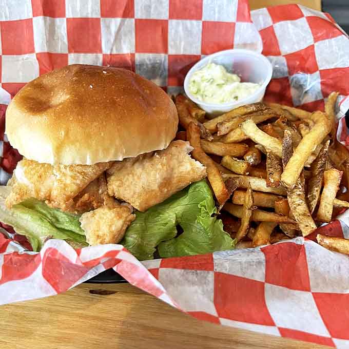 The whitefish sandwich: proof that perfection doesn't require complexity, just fresh fish and simple accompaniments.