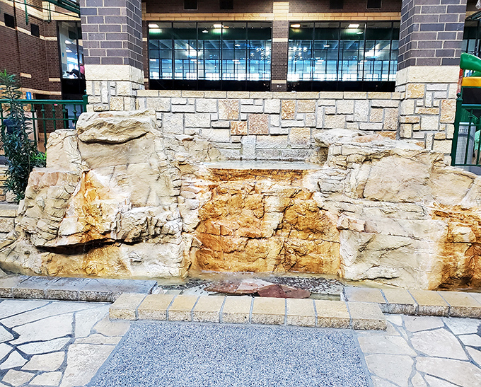 An artificial waterfall that looks so real, you might momentarily forget you're indoors and not hiking through some scenic gorge.