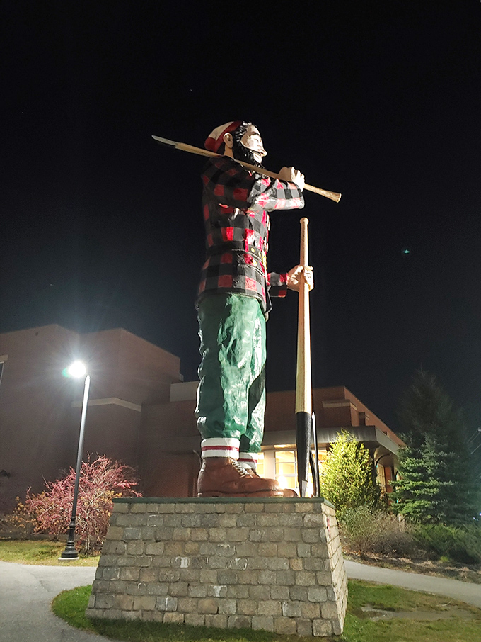 Even after dark, Paul stands vigilant, illuminated against the night sky like a beacon of folklore.