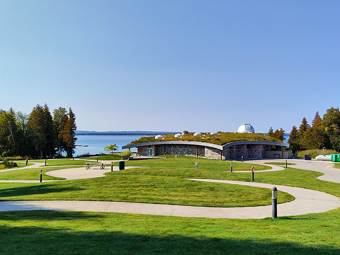 Winding paths and manicured grounds invite daytime exploration before the celestial show begins after sunset.