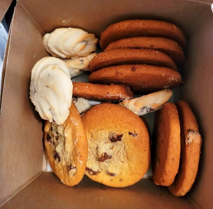 Cookie heaven exists, and it's arranged neatly in these trays where chocolate chip neighbors with Italian wedding cookies in sweet harmony.