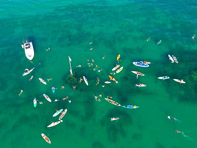 Kayakers paddle over history, peering down at the wreck below. Who needs expensive glass-bottom boats when you've got crystal-clear Florida waters?