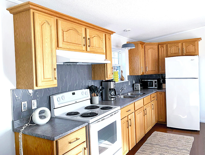No galley kitchen compromises here &ndash; full-sized appliances and ample counter space for cooking up your catch of the day.