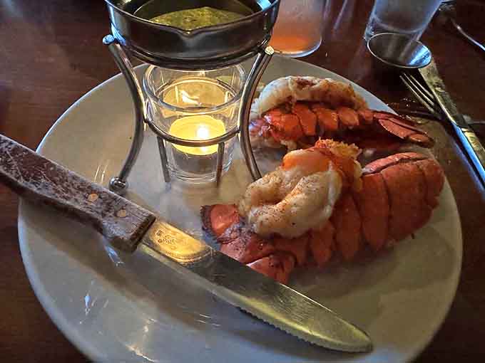 Lobster tails arrive like treasures from the sea, perfectly split and ready for their butter bath – a landlocked luxury in Wisconsin's heartland.
