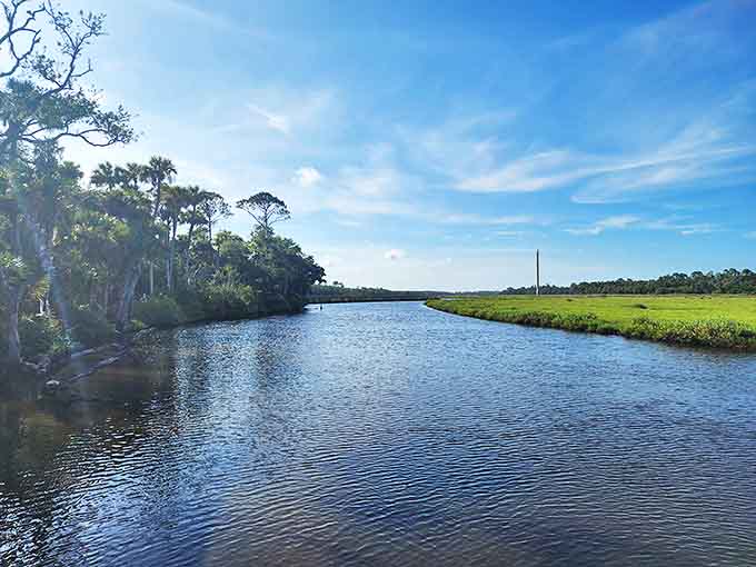 The Halifax River flows alongside portions of the route, its calm waters offering a serene counterpoint to the crashing Atlantic just minutes away.