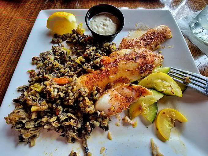 Fresh seafood that tastes like it jumped from lake to plate, served with seasonal vegetables that actually deserve their place.