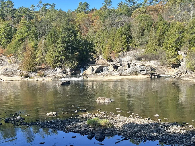 Vermont's geological masterpiece on display &ndash; rocky outcroppings and crystal-clear waters create nature's perfect postcard moment.