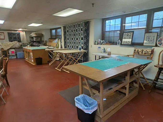 The workshop area beckons with promise &ndash; those tables have witnessed countless "eureka" moments when pattern pieces finally align just right.