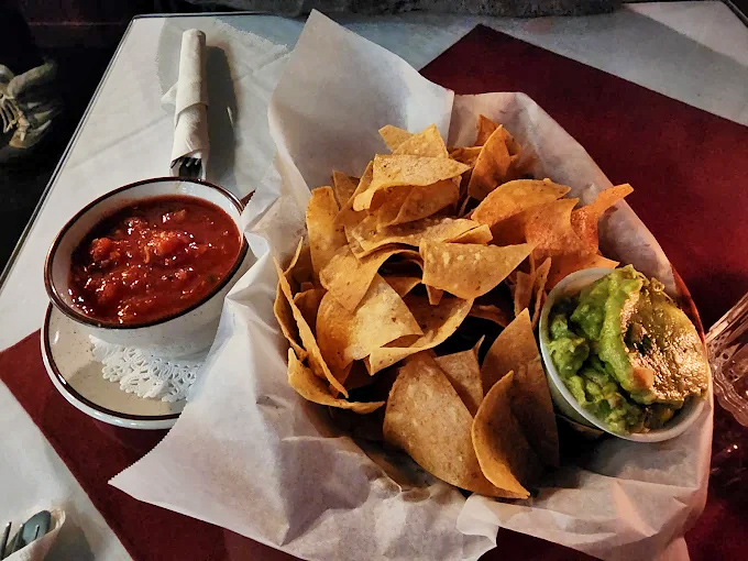These aren't just nachos &ndash; they're an edible monument to excess done right, with crispy chips practically buckling under fresh salsa and guacamole.