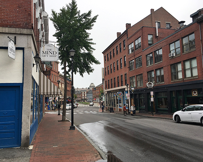 Historic brick buildings line Portland's charming streets, where local shops and restaurants create a vibrant downtown experience.