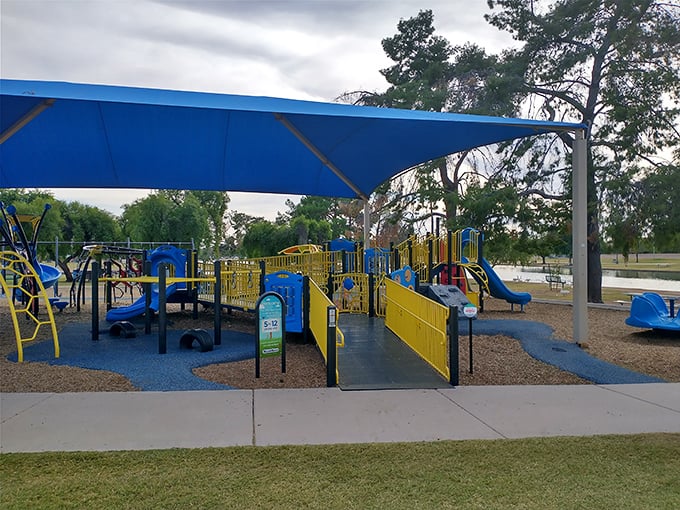 The perfect spot for afternoon fun! This shaded playground at Chaparral Park is ready for little explorers to enjoy themselves.