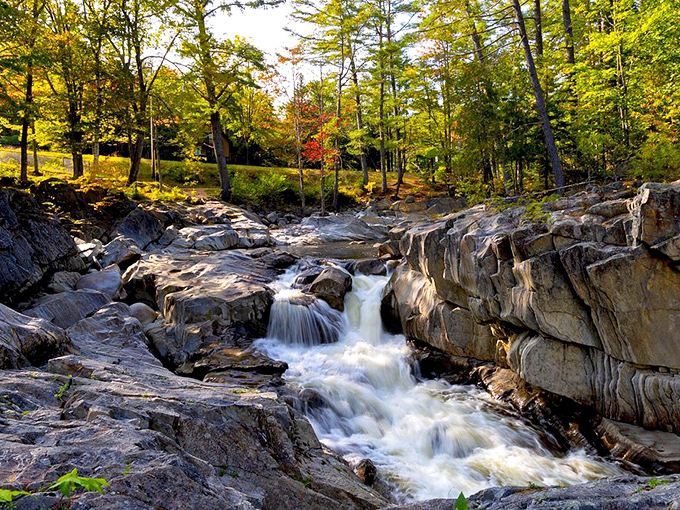 Coos Canyon's reddish-pink granite walls frame the Swift River as it tumbles through perfectly carved chutes.