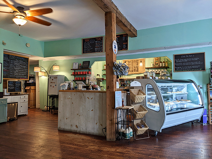 Southern Pie Cafe's cozy interior features wooden beams and a display case that makes choosing just one slice nearly impossible.