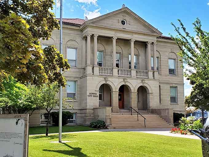 The Freedom Torch monument stands tall against blue skies, celebrating American liberty with bold stars and stripes.