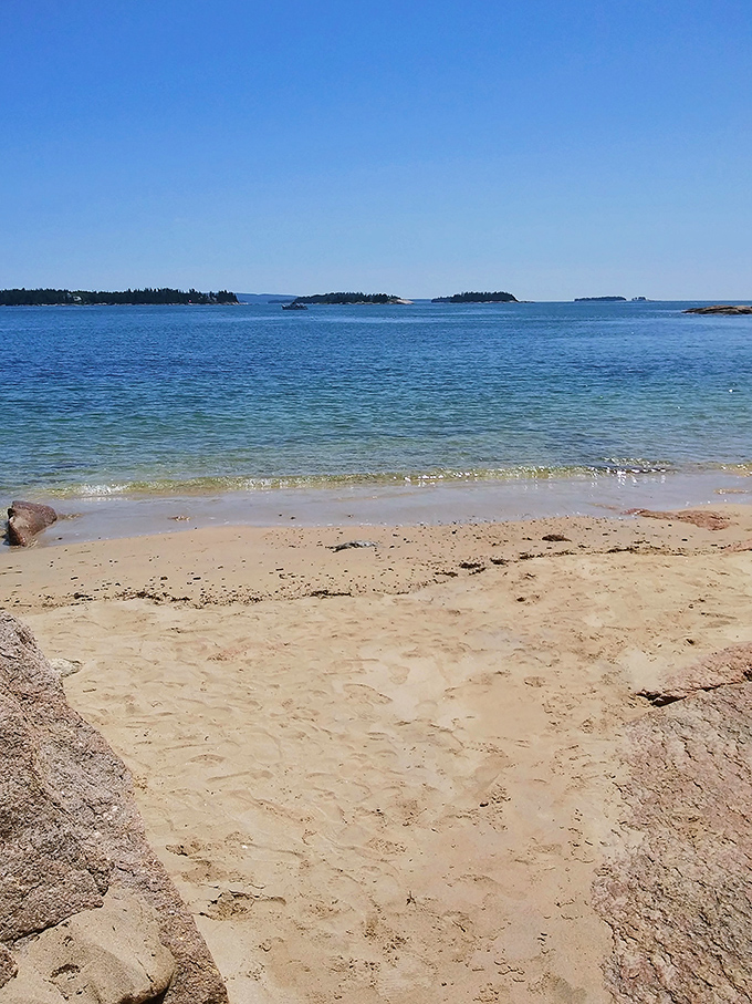 The magical sandbar at Barred Island appears like a secret pathway, connecting mainland to island adventure.