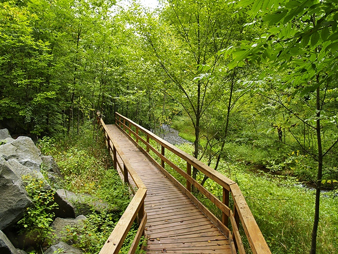The wide, graceful flow of Cascade Falls demonstrates why this natural feature has drawn visitors for generations.