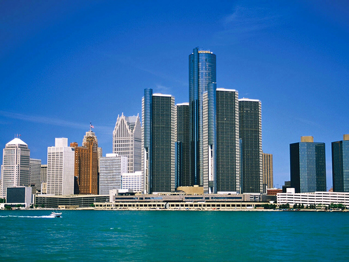 The Detroit Riverwalk provides perfect viewing spots to admire the city skyline and watch boats on the water.