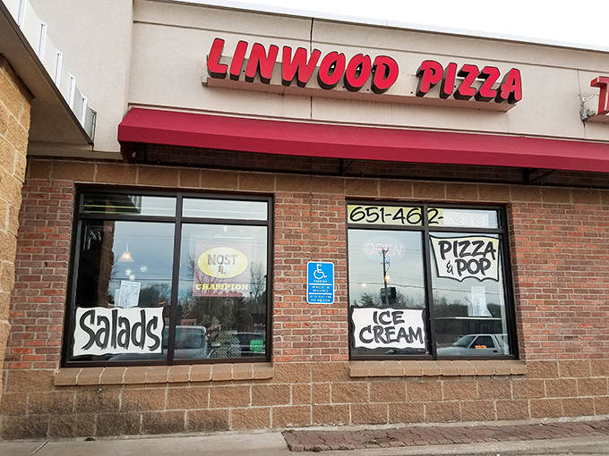 The straightforward exterior of Linwood Pizza hides a beloved local institution where "Pizza & Pop" and "Ice Cream" are simple pleasures done right.