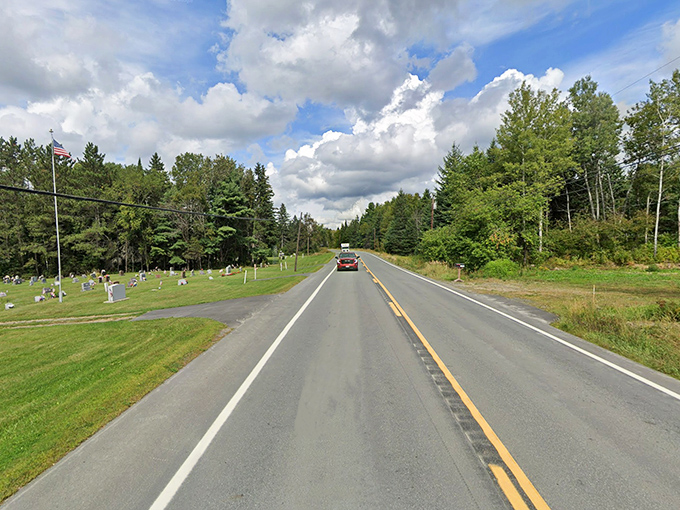 Masardis' rural landscape stretches toward distant hills, with autumn colors painting the countryside in spectacular hues.