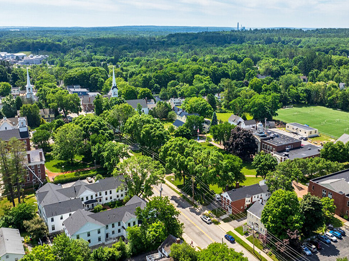 Summer's lush greenery embraces this picture-perfect town, where tree-lined streets lead to white churches and tidy neighborhoods.