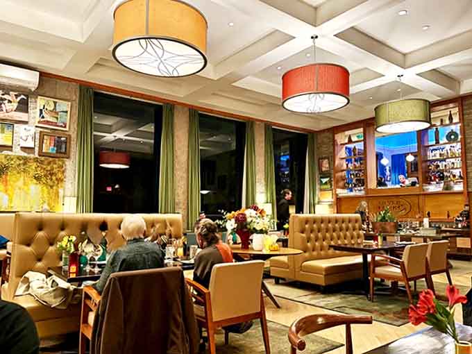 Contemporary design elements and thoughtful lighting make every meal feel special in this intimate Manchester dining room.